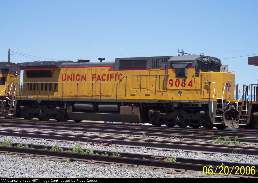 UP 9084 with new paint, lightening stripe, and lower yellow stripe.